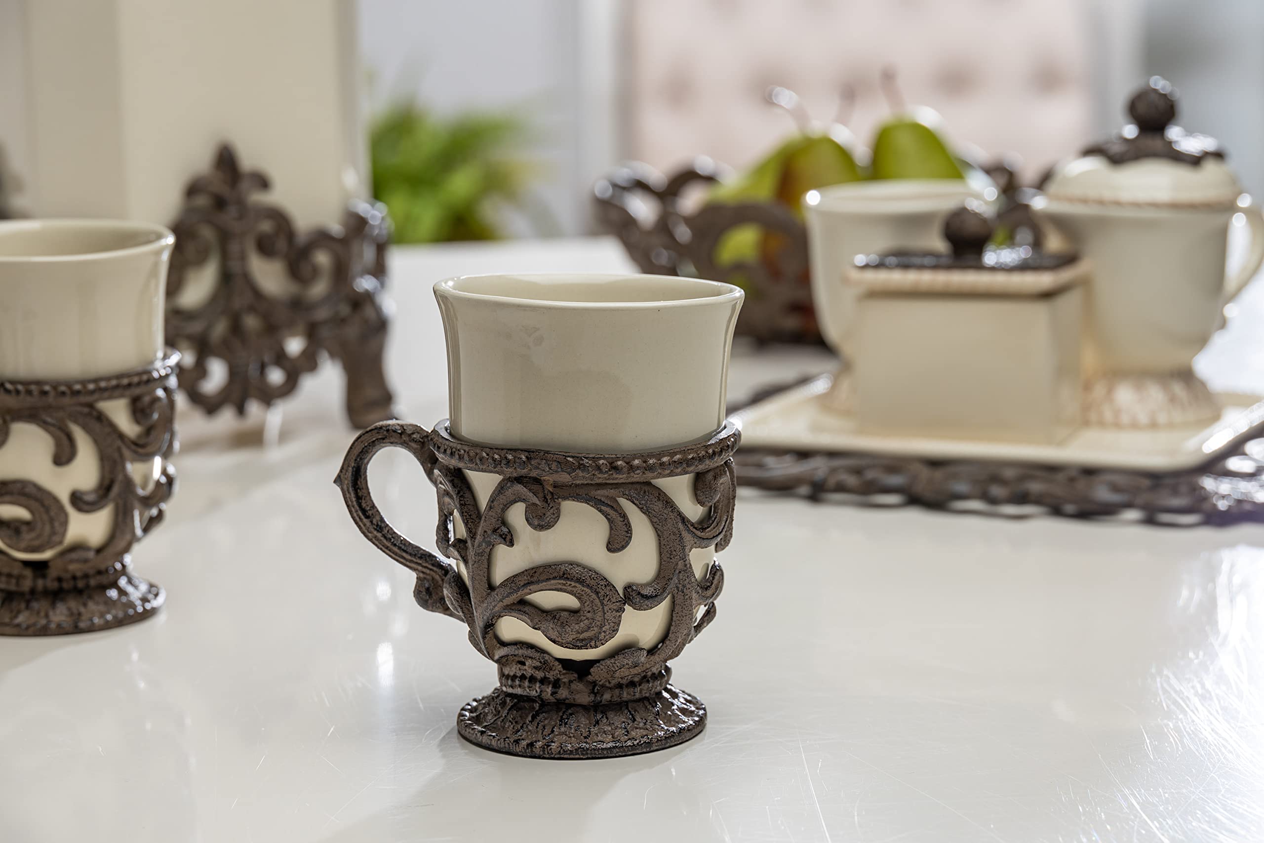 GG Collection Acanthus Leaf Cream Ceramic Cups with Brown Metal Base and Handle (Set of 4)