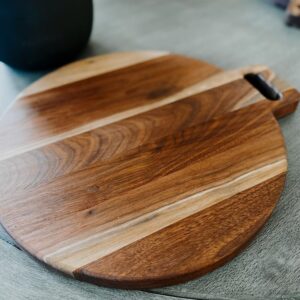 Round charcuterie serving board with handle, handmade in the USA with Walnut hardwood.