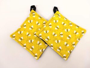 potholder set in a honey bee fabric pattern by sewuseful studios llc