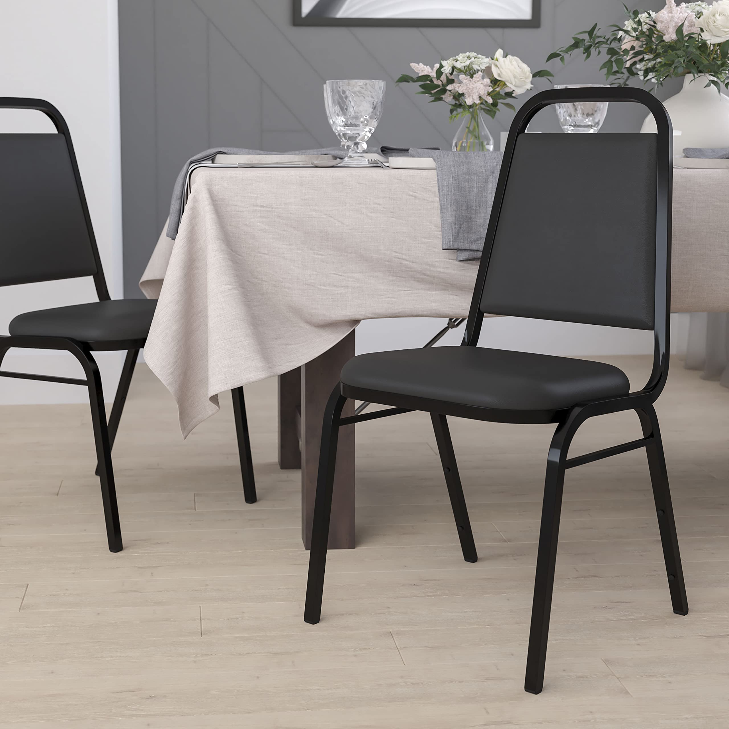 Flash Furniture HERCULES Series Trapezoidal Back Stacking Banquet Chair in Black Vinyl - Black Frame