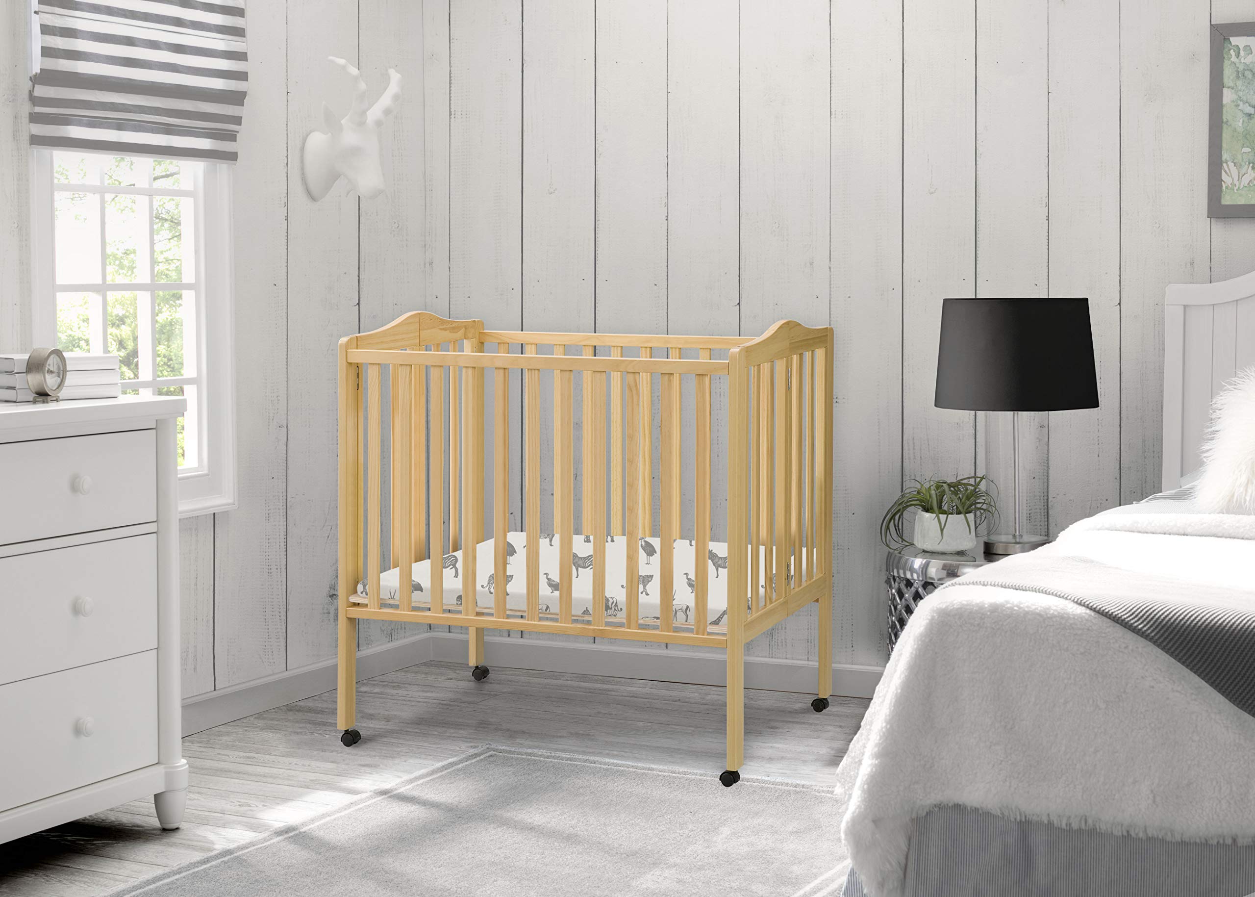 Delta Children Folding Portable Mini Baby Crib with 1.5-inch Mattress - Greenguard Gold Certified, Natural