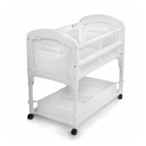 arm’s reach cambria co-sleeper bedside bassinet featuring height-adjustable legs, curved wooden ends, breathable mesh sides with pockets, and large lower storage basket, white