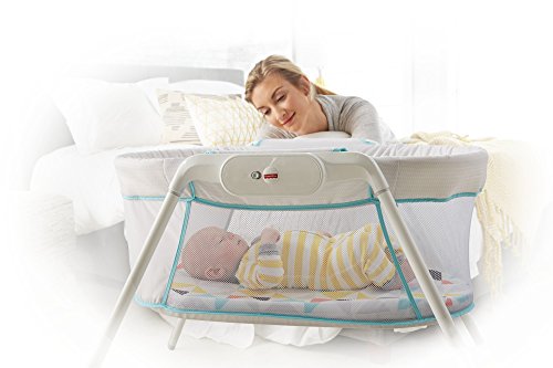 Fisher-Price Stow 'n Go Bassinet Windmill, portable baby cradle with soothing features for infants and newborns