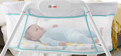 Fisher-Price Stow 'n Go Bassinet Windmill, portable baby cradle with soothing features for infants and newborns