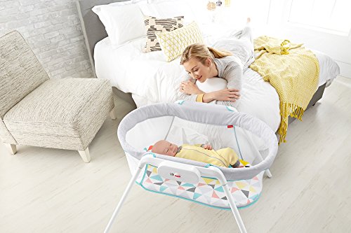 Fisher-Price Stow 'n Go Bassinet Windmill, portable baby cradle with soothing features for infants and newborns