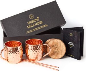 moscow mule copper mugs set - 2 authentic handcrafted copper mugs (16 oz.), 2 straws, 2 solid wood coasters and recipe book - gift box included