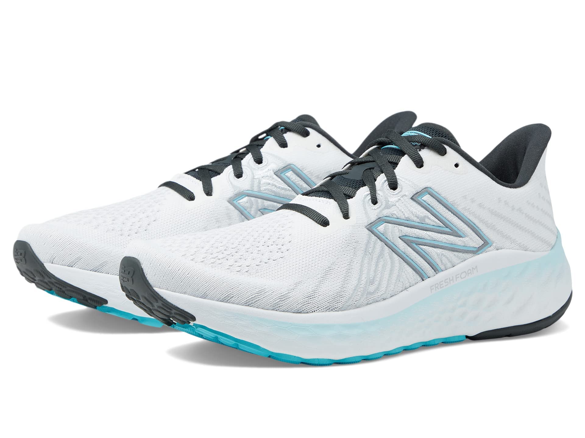 New Balance Women's Fresh Foam X Vongo V5 Running Shoe, White/Bleach Blue/Silver Metalic, 8