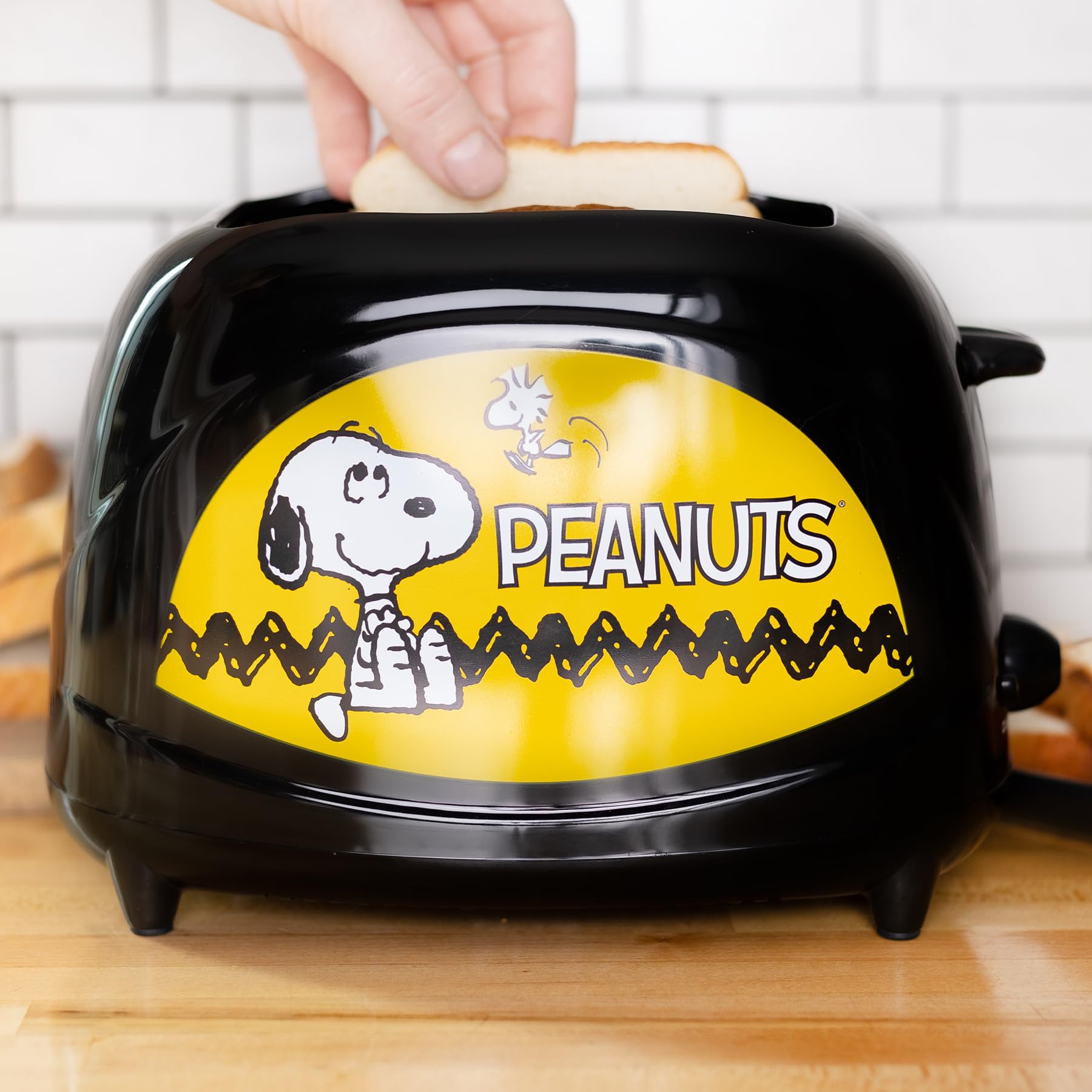 Uncanny Brands Peanuts Snoopy Two-Slice Toaster- Toasts Your Favorite Beagle On Your Toast