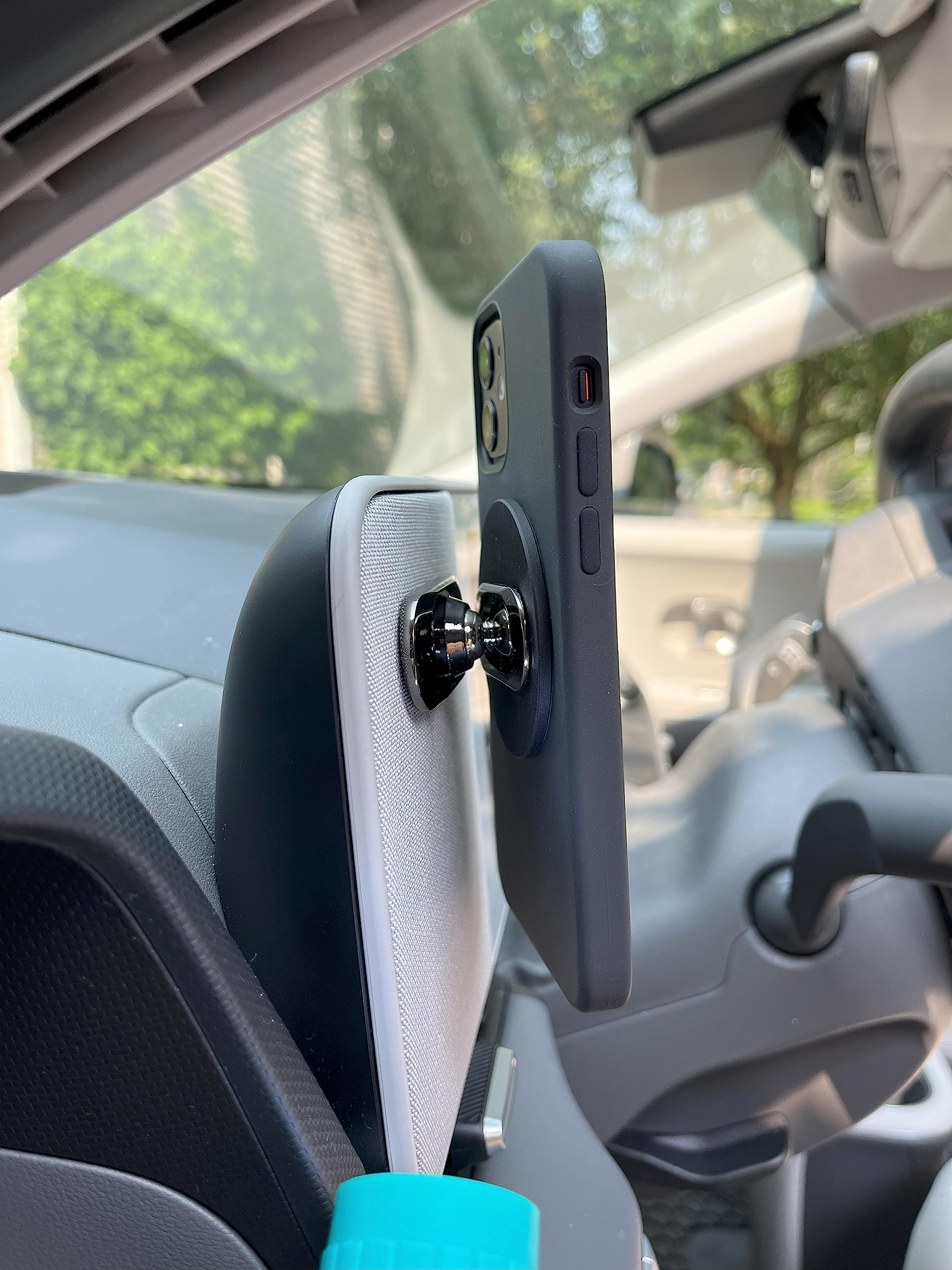 iPhone Holder Mount for Hyundai Ioniq 5. Attaches Magnetically to Metallic Dashboard. Compatible with MagSafe for iPhone 12/13/14/15 Series.