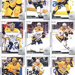 2020-21 O-Pee-Chee Nashville Predators Team Set of 16 Cards: Juuse Saros(#5), Mikael Granlund(#85), Calle Jarnkrok(#152), Viktor Arvidsson(#220), Craig Smith(#254), Filip Forsberg(#266), Rocco Grimaldi(#286), Pekka Rinne(#329), Kyle Turris(#395), Ryan Joh