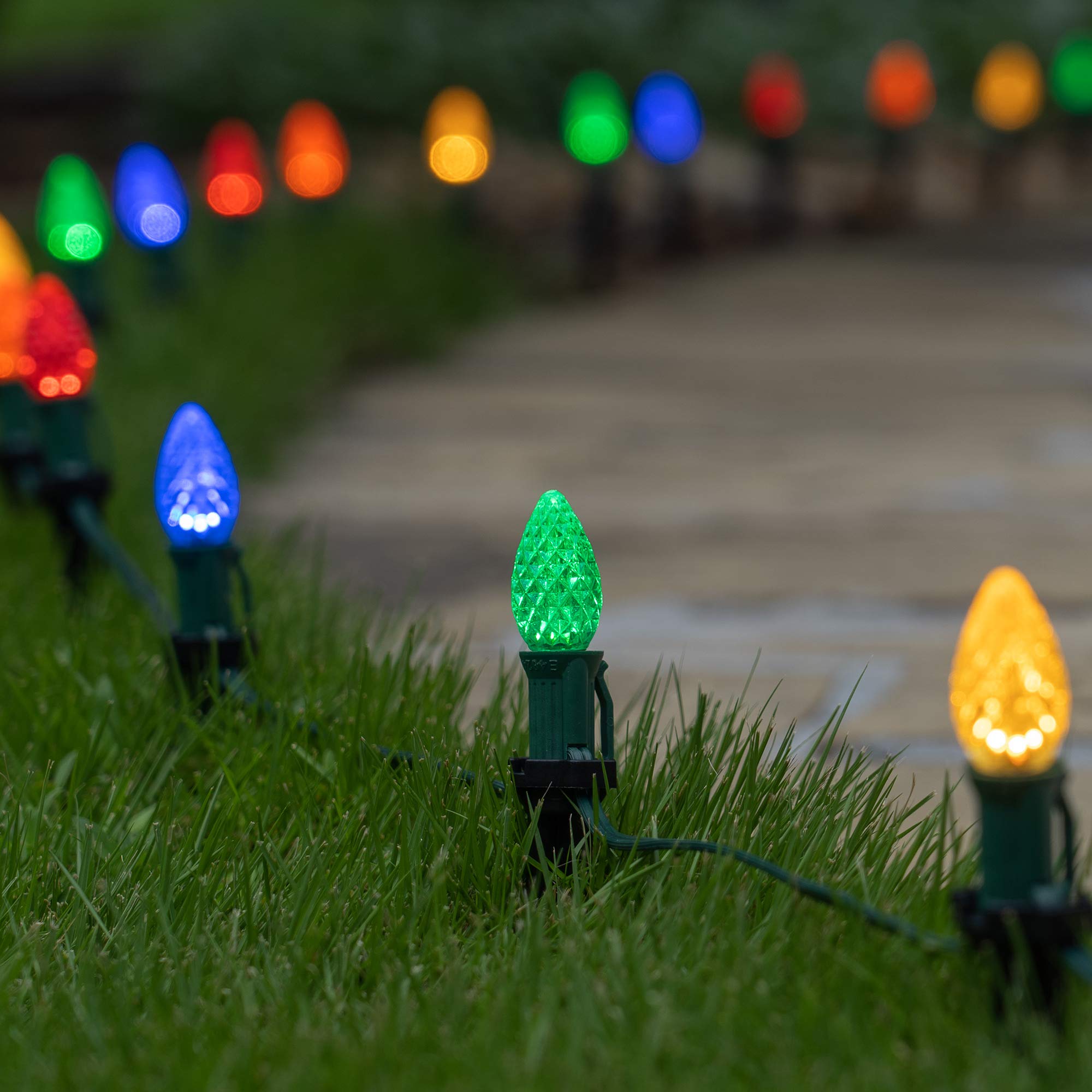 50’ OptiCore LED C7 Multicolor Christmas Pathway Lights, C7 Landscape Lights, 4.5” Stakes, Green Wire Plug String Lights