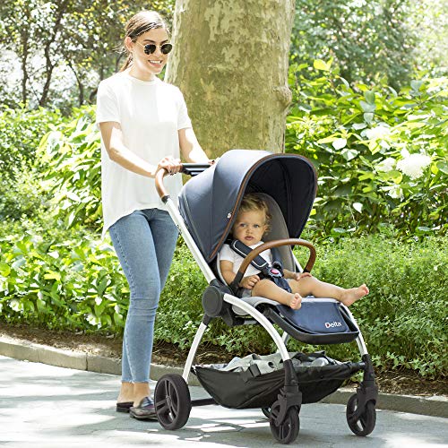 Delta Children Revolve Reversible Stroller, Navy - Leather Handlebar; One Hand Easy Fold; Lightweight Shock-Absorbing Frame; Reclining Seat and Adjustable Footrest