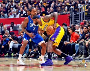 lebron james los angeles lakers unsigned vs. kawhi leonard photograph - original nba art and prints