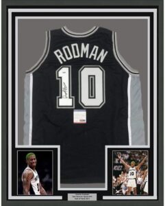 framed autographed/signed dennis rodman 33x42 san antonio black basketball jersey psa/dna coa