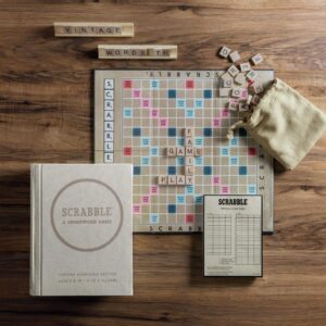 Scrabble, Monopoly, and Clue Vintage Board Game Bookshelf Collection