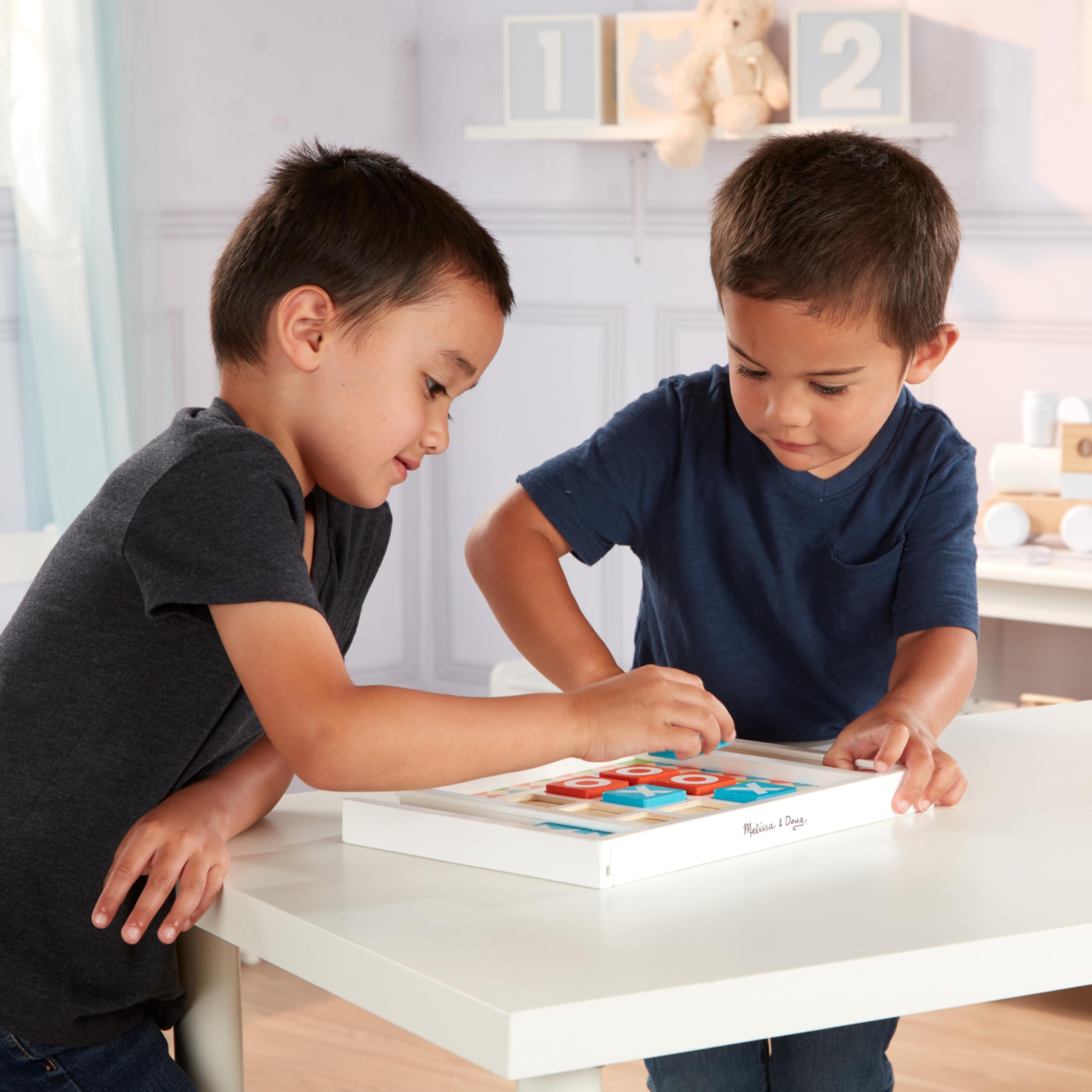 Melissa & Doug Wooden Tic-Tac-Toe Board Game with 10 Self-Storing Wooden Game Pieces (12.5ââ‚¬ W x 8.5ââ‚¬ L x 1.25ââ‚¬ D)