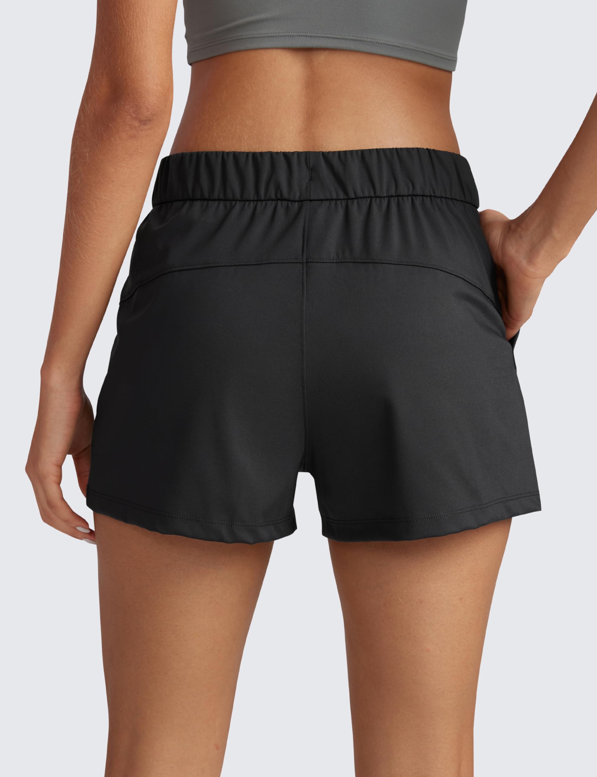 CRZ YOGA Stretch Shorts for Women Work Casual 2.5'' - Athletic Shorts with Pockets for Workout Travel Hiking Golf Black Medium