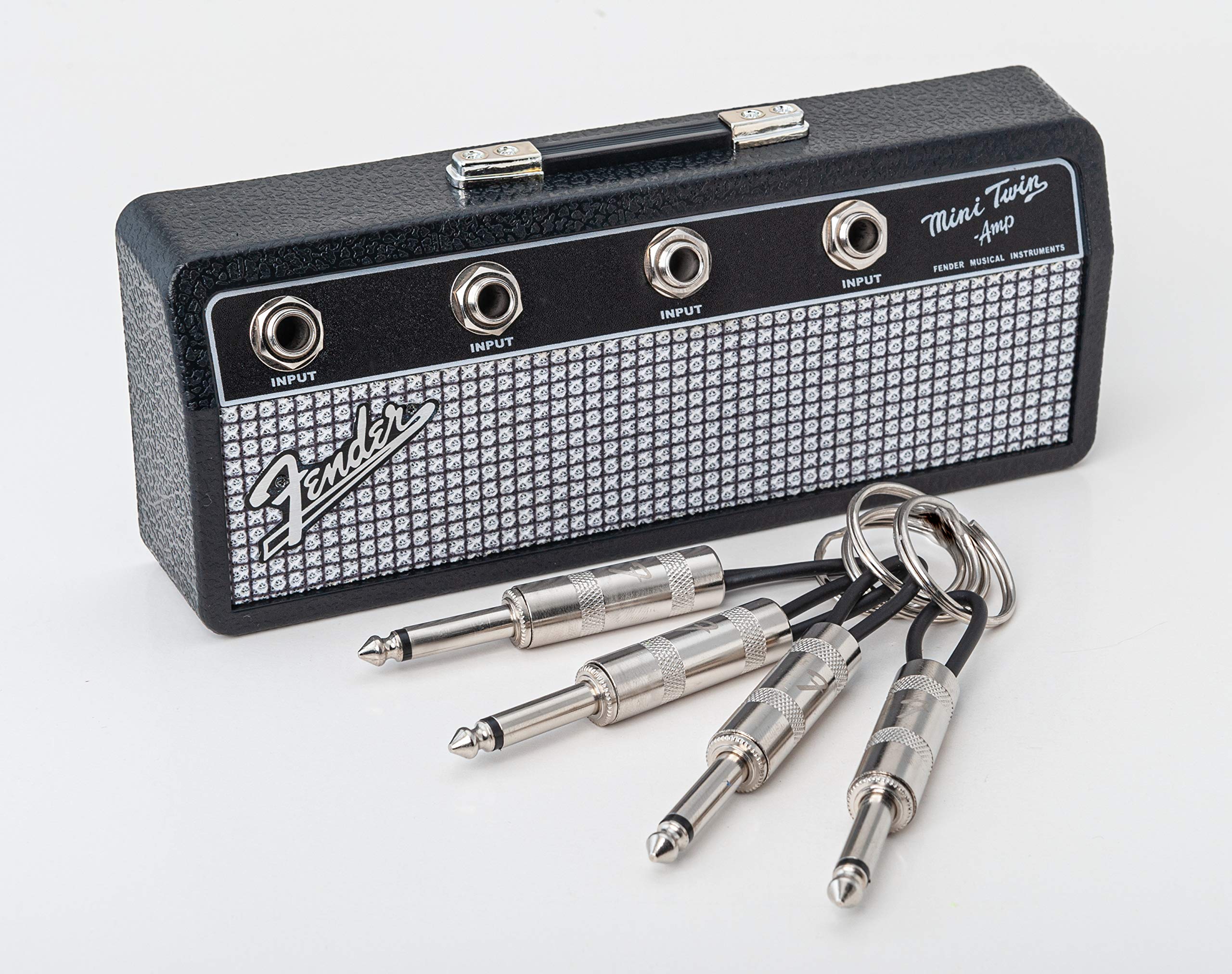 Licensed Fender Jack Rack- guitar amp key holder, includes 4 guitar plug keychains and 1 wall mounting kit. Quick and easy installation.