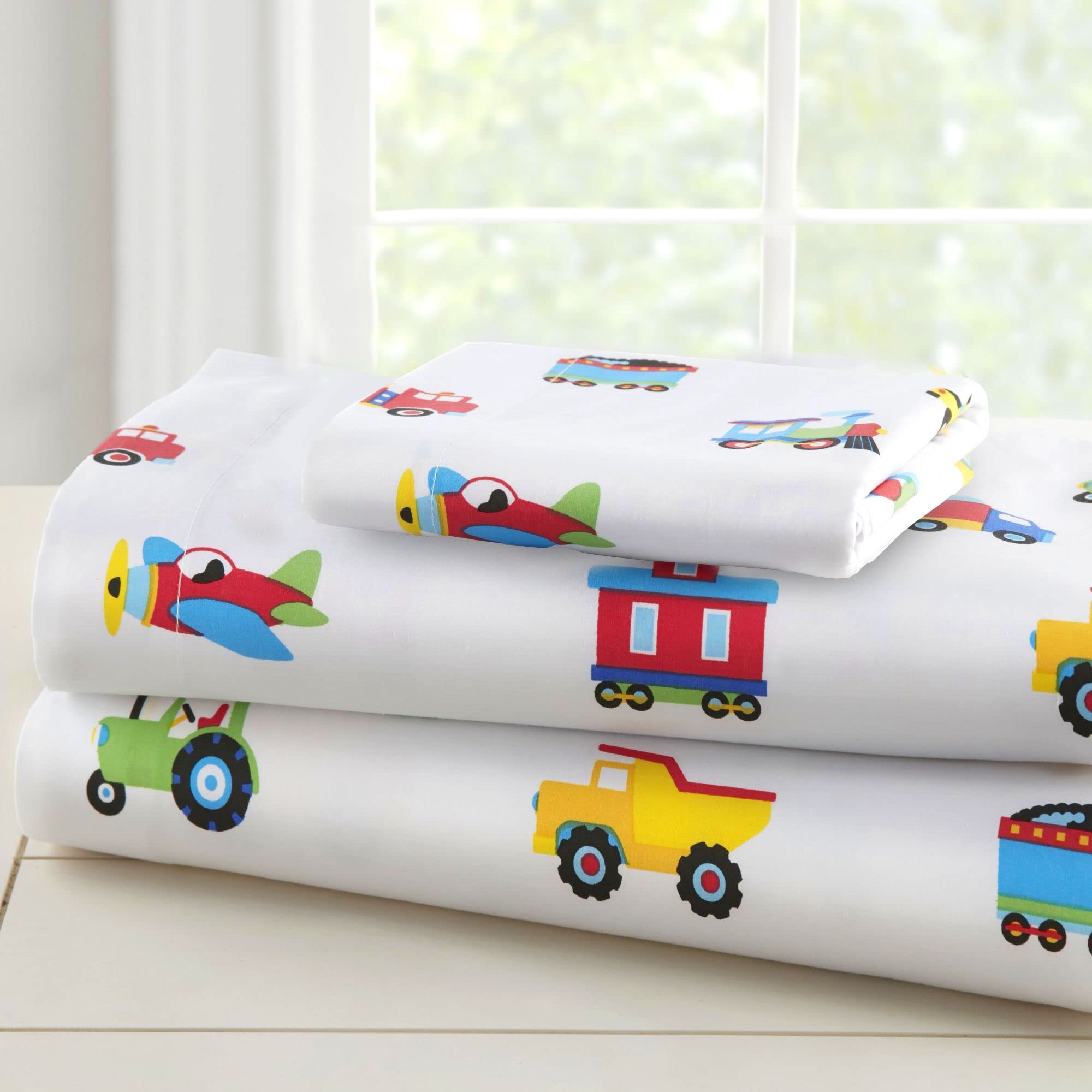 Wildkin 100% Cotton 4 Piece Toddler Bed-in-A-Bag for Boys & Girls, Bedding Set Includes Comforter, Flat Sheet, Fitted Sheet & Pillowcase, Bed Set for Cozy Cuddles (Trains, Planes & Trucks)