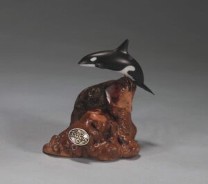 orca sculpture by john perry small down-tail version 4 inches tall.