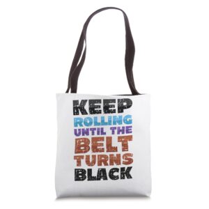 keep rolling until the belt turns black karate tote bag