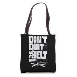 don't quit until the belt turns black black belt mma belts tote bag