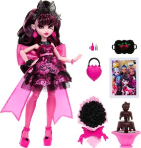 monster high monster ball doll, draculaura in party dress with themed accessories including chocolate fountain