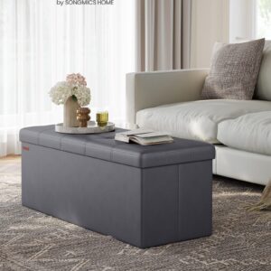 SONGMICS 43 Inches Folding Storage Ottoman Bench, Storage Chest, Footrest, Coffee Table, Padded Seat, Faux Leather, Holds up to 660 lb, Dark Gray ULSF070G01