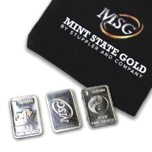 mint state gold three (3) one gram .999 pure silver bars with random designs in a jewelry pouch