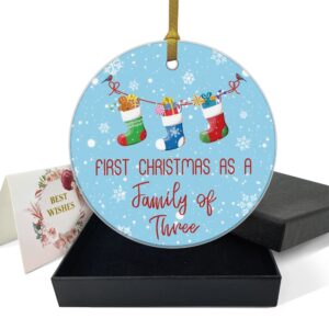 rewidparty our first christmas as a family of three ceramic ornament christmas socks gift for baby new parents baby first christmas tree decor 3" circle ceramic ornament with gold ribbon & gift box