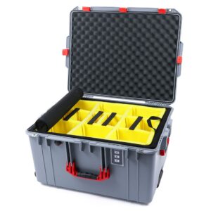 silver pelican 1637 air case with red handles & latches. comes with yellow padded dividers.