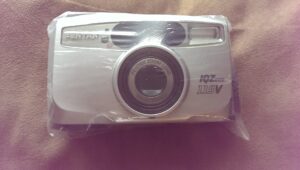 pentax iq zoom 115v date camera