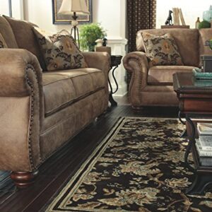 Signature Design by Ashley Larkinhurst Faux Leather Sofa with Nailhead Trim and 2 Accent Pillows, Brown