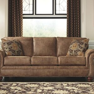 Signature Design by Ashley Larkinhurst Faux Leather Sofa with Nailhead Trim and 2 Accent Pillows, Brown