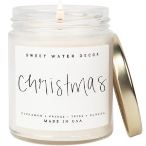 sweet water decor christmas scented candle | cinnamon, trees, orange, and clove scents | christmas candles and decor for home | 9oz. clear jar soy candle, made in the usa