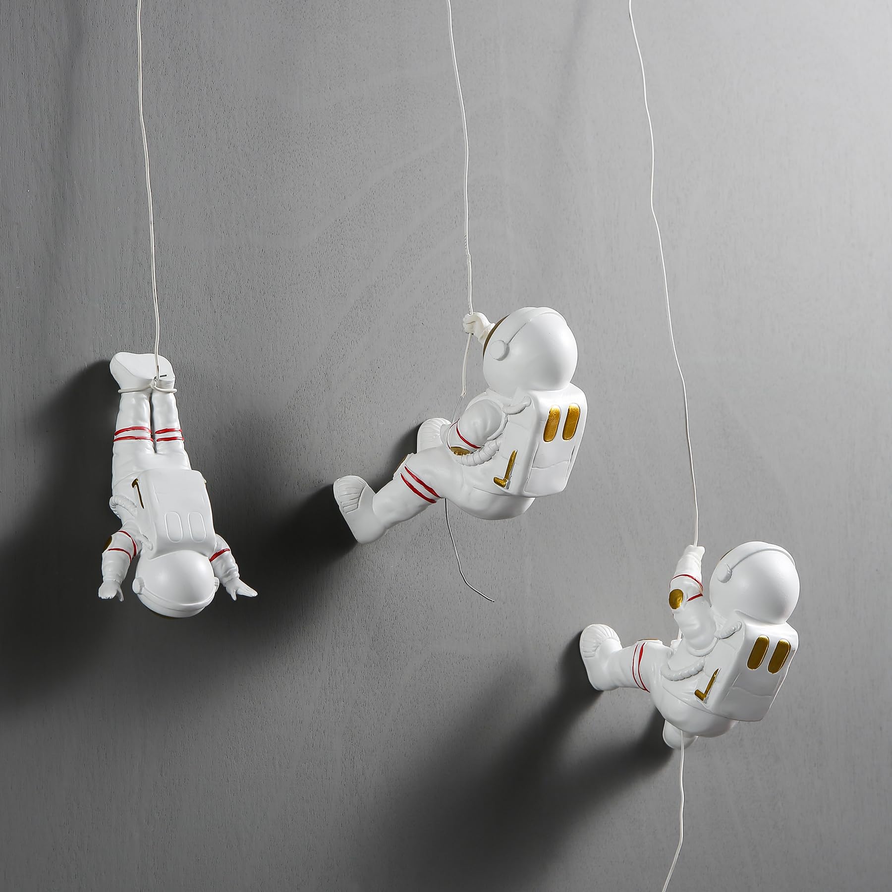 AWNR 3Pcs Climbing Astronaut Figurine Wall Hanging Decor Modern Home Decor Outer Space Theme Decorations Wall Sculptures Space Decor Background 3D Wall Decor for Bedroom Living Room Kids Room