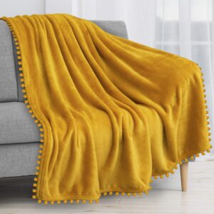 pavilia mustard yellow throw blanket pom pom for couch, twin size, soft fleece cozy pompom fringe sofa blanket, decorative home gift flannel velvet, gold yellow, 50x60