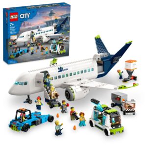 lego city passenger airplane 60367 building toy set; fun airplane stem toy for kids with a large airplane, passenger bus, luggage truck, container loader, and 9 minifigures