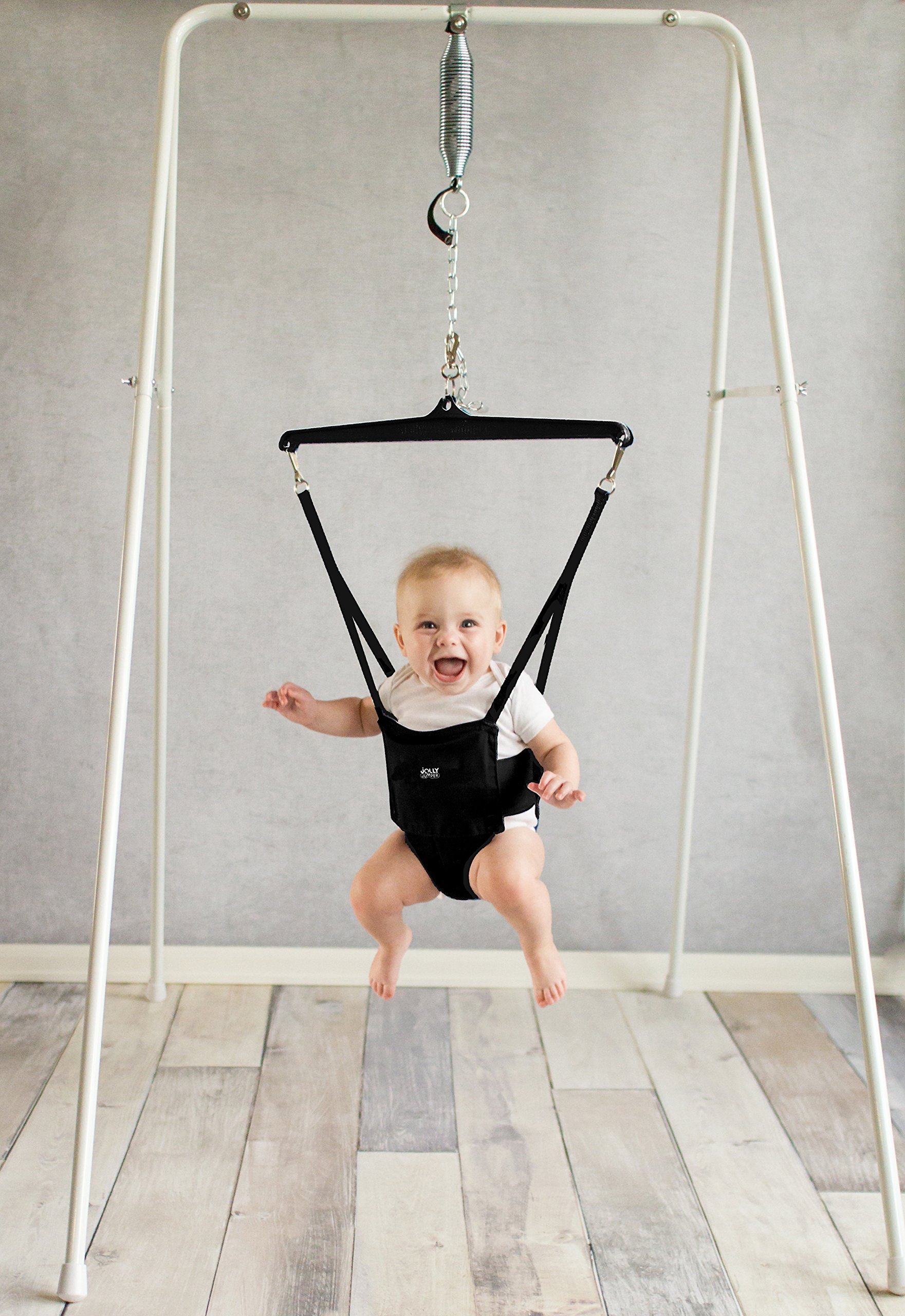 Jolly Jumper **CLASSIC** - Black Saddle- The Original Jolly Jumper with stand. Trusted by parents to provide fun for babies and to create cherished memories for families for over 75 years.