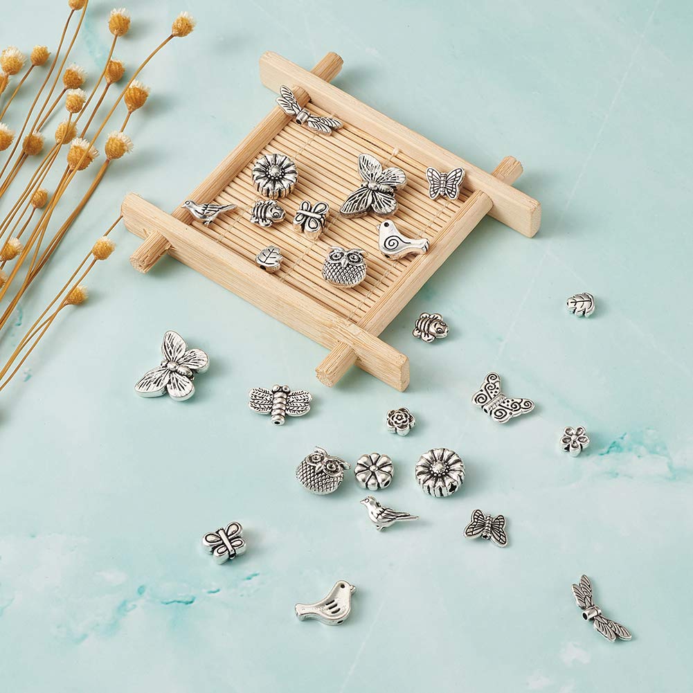 Cheriswelry 150pcs 15styles Tibetan Silver Butterfly Flower Beads Spacer Antique Silver Dragonfly Insect Bird Bee Beads Charms Loose Beads for Women Rosary Jewelry Making Supplies