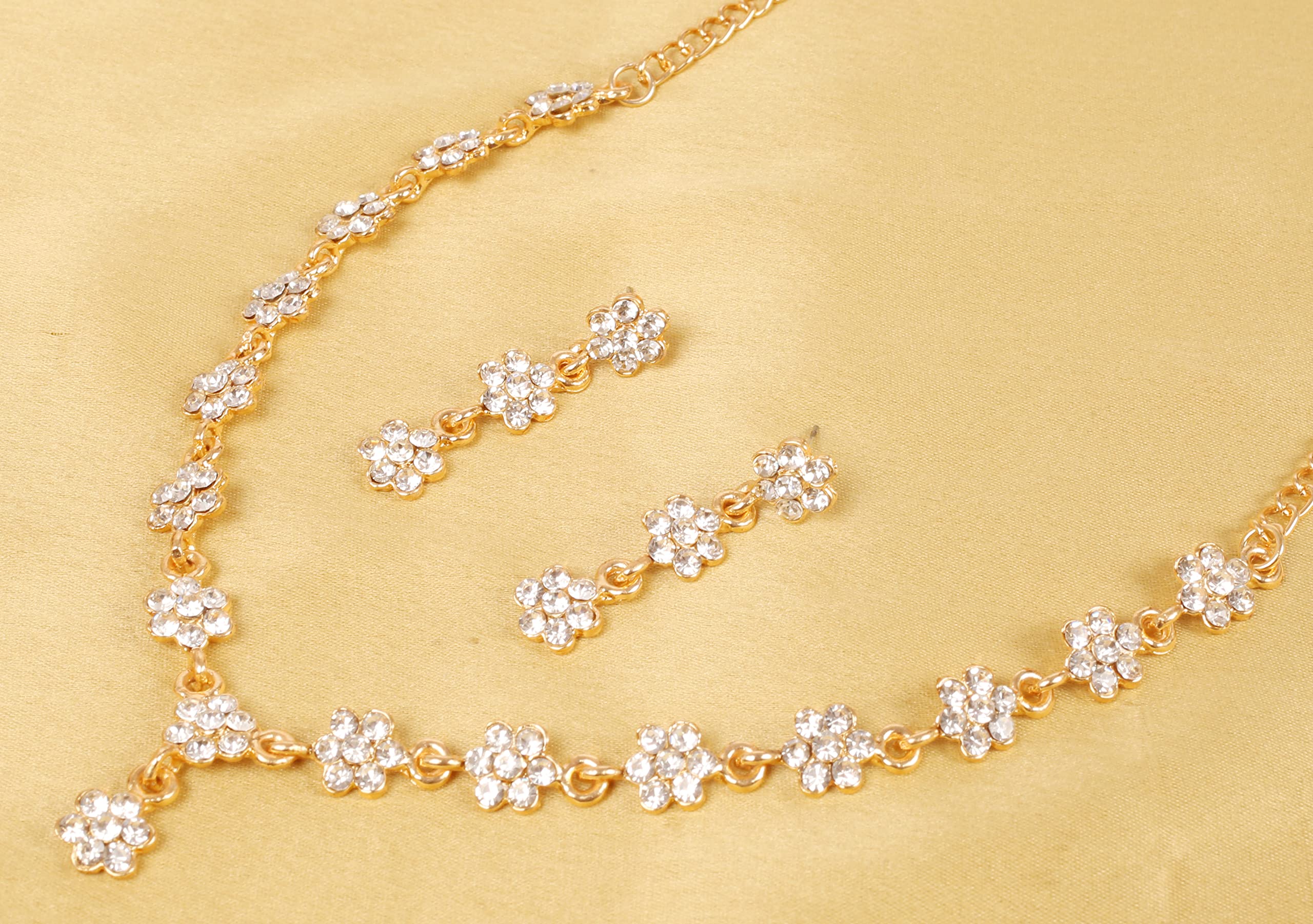 Sunsoul By Touchstone Indian Bollywood Handcrafted Traditional Floral Pattern White Rhinestone Designer Jewelry Necklace Set In Gold Tone For Women.