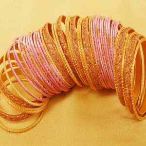 Touchstone Indian Bollywood Glamorous Fashion Wrist Enhancing Shimmering Golden Glitters Textured Peach Color Designer Jewelry Bracelets Bangle Chura. Set of 48 in Gold Tone for Women.