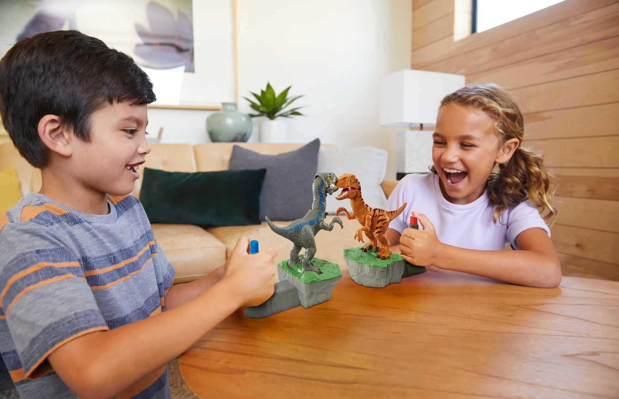 Mattel Games Rock 'Em Sock 'Em Raptors Jurassic World Domination Kids Game Fighting Raptors with Blue vs Atrociraptor