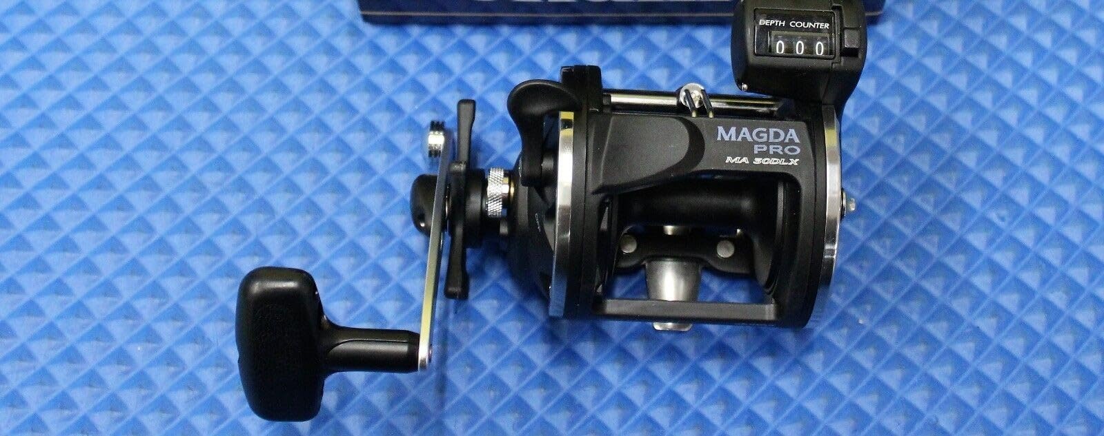 Okuma Magda Pro Line Counter Levelwind Trolling Reel, Small, Black/Silver, MA-20DX