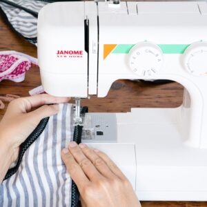 Janome MOD-15 Easy-to-Use Sewing Machine with 15 Stitches, Adjustable Stitch Length and 5-Piece Feed Dogs