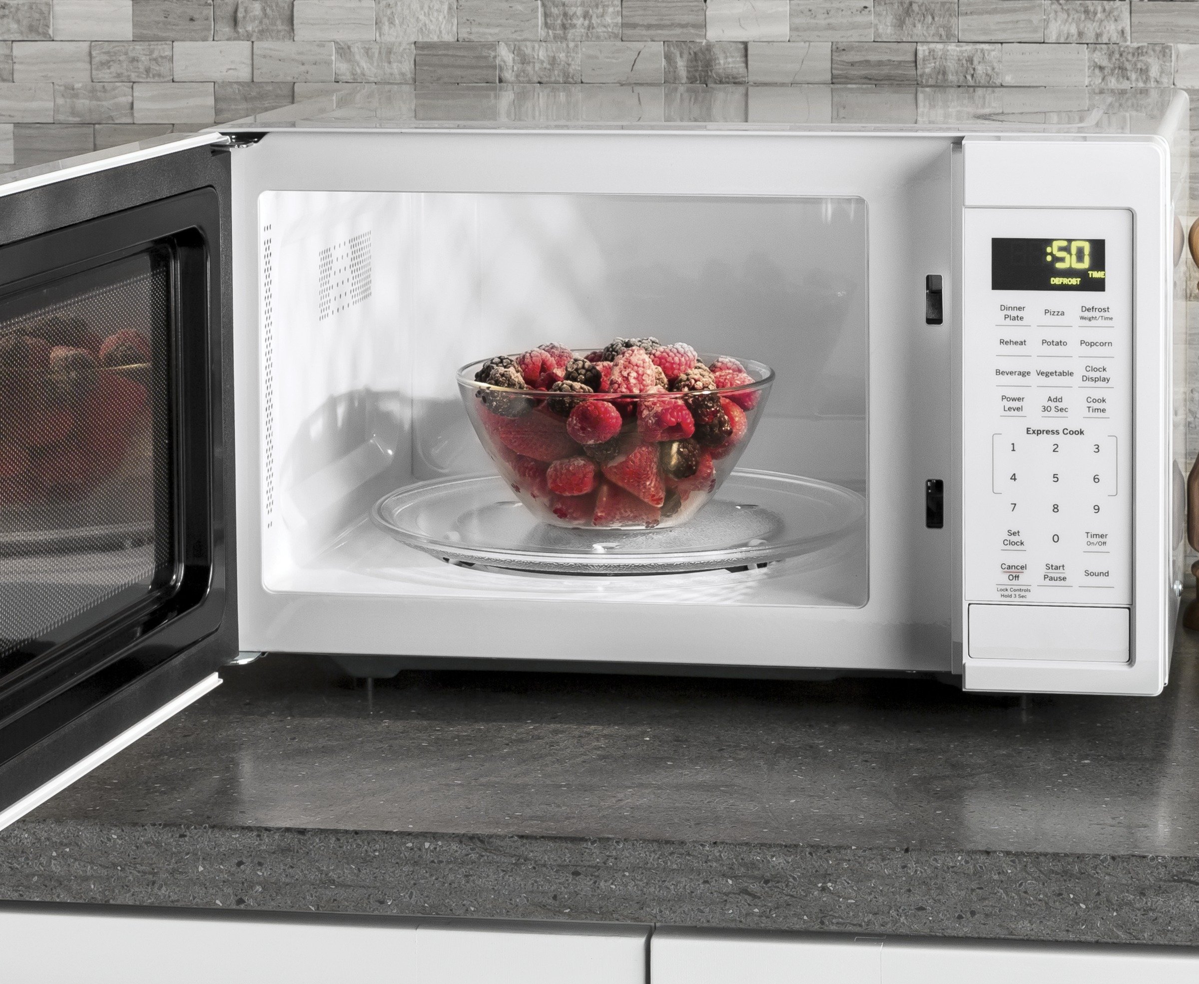 GE Countertop Microwave Oven | 0.9 Cubic Feet Capacity, 900 Watts | Kitchen Essentials for the Countertop or Dorm Room | White