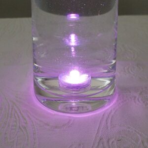 KITOSUN Submersible LED Lights cr2032 Battery Powered Underwater Waterproof LED Tea Light Candles for Events Wedding Centerpieces Vase Floral Xmas Holidays Home Decor Lighting(Pack of 12) (Pink)