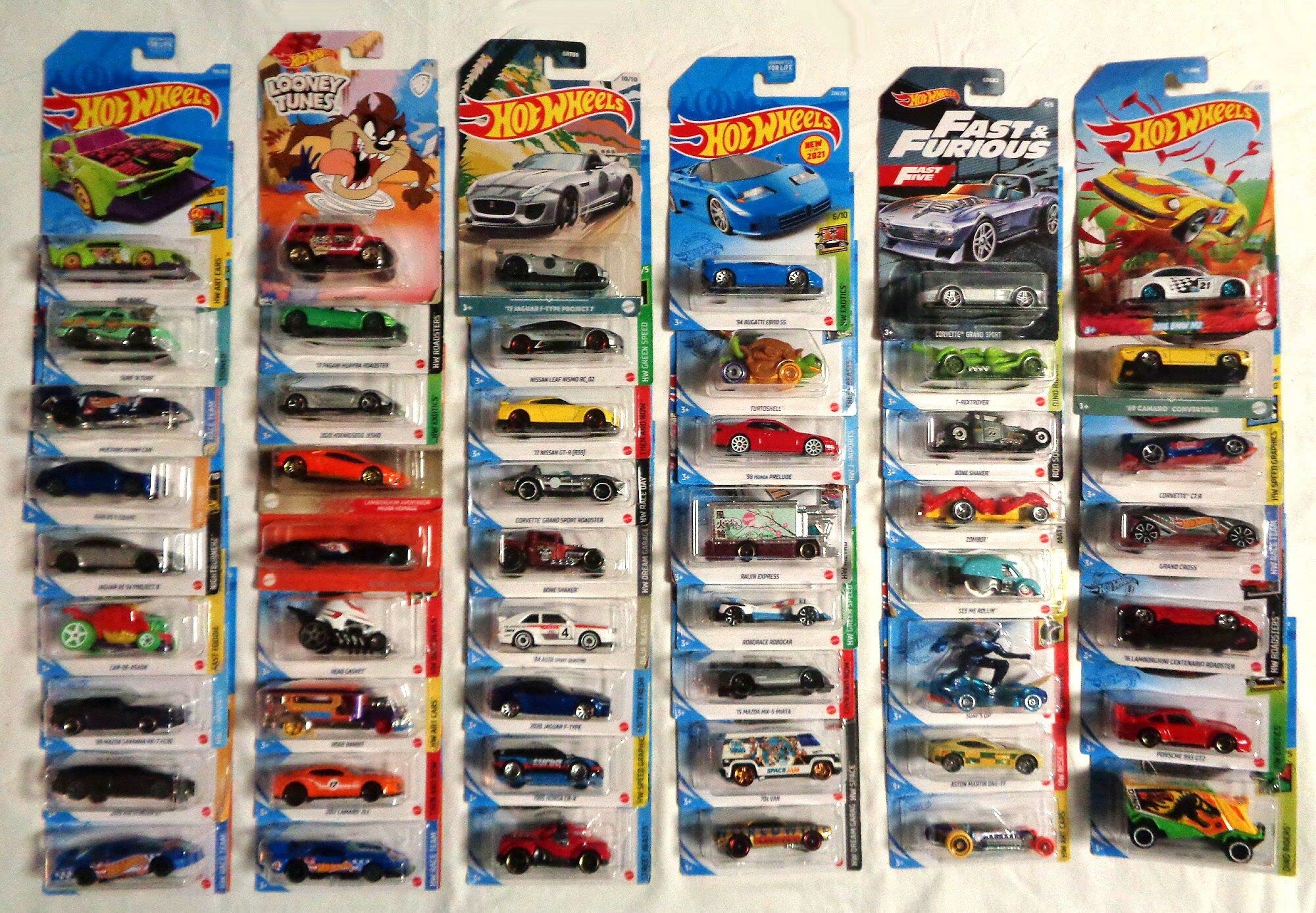 Assortment lot of 50 Different Hotwheels diecast Cars and Trucks