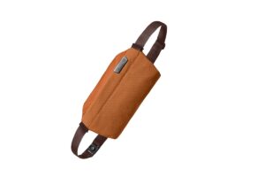 bellroy mini sling slim shoulder bag for men and women, lightweight, water resistant, multiple organisation compartments - bronze