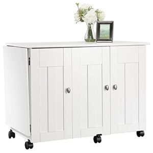 bowery hill engineered wood drop-leaf sewing or craft table with melamine top surface, storage behind roll-open door, easy-roll casters in soft white